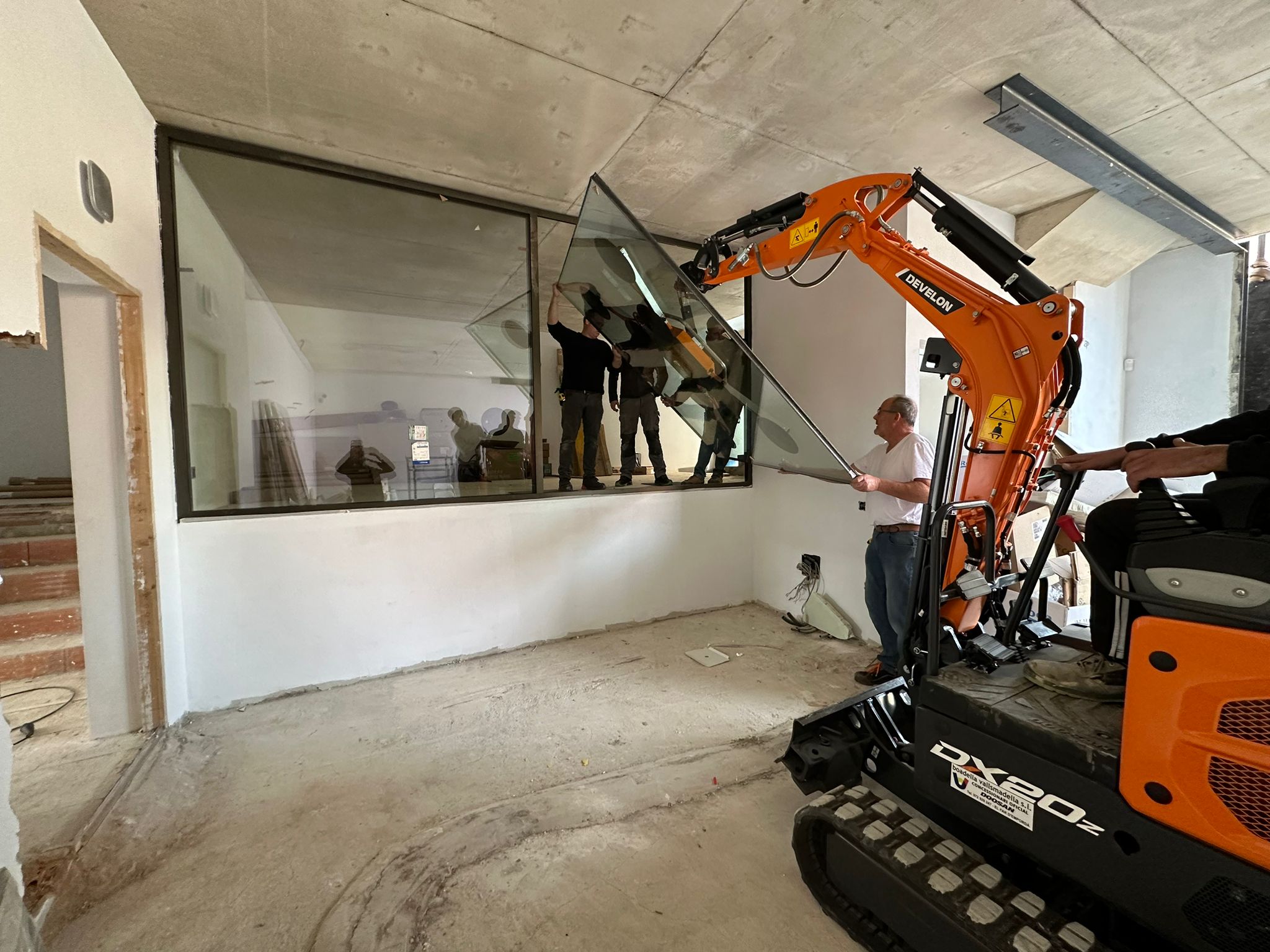 Professional Demolition International - Develon mini excavator used to ...